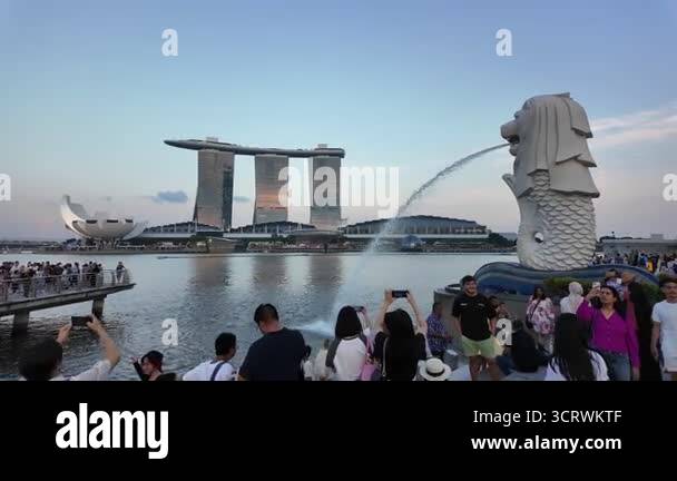 Marina Sand, Singapore - Jul 17 2024: A group of people are taking ...