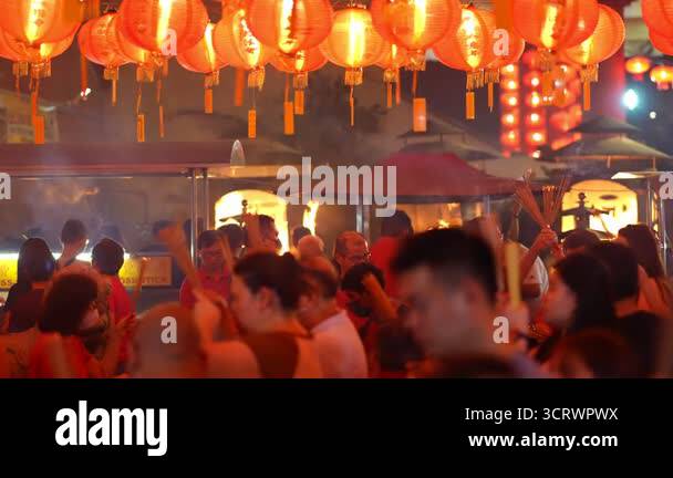 George Town, Penang, Malaysia - Feb 09 2024: Worshippers pray under ...