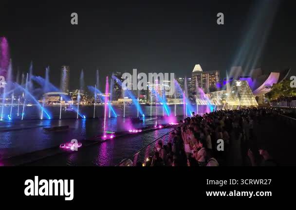 Marina Sand, Singapore - Jul 17 2024: Families and tourists recording ...