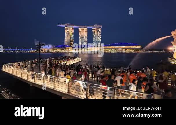 Marina Bay, Singapore - Jul 09 2024: A crowd of people are gathered on ...