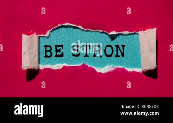Be Strong message written on ripped torn paper background. Conceptual ...