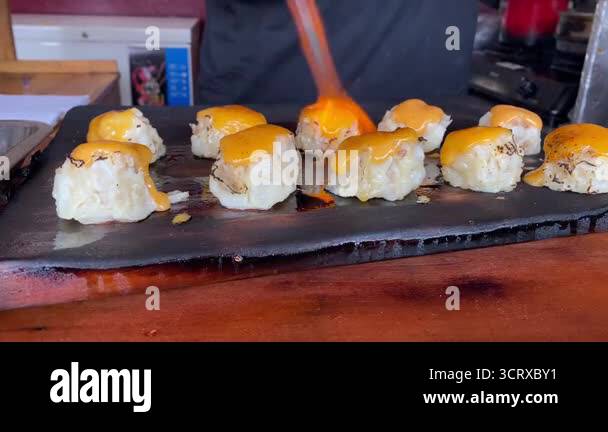 Torch mentai dim sum combines juicy dim sum with creamy, spicy cod roe ...