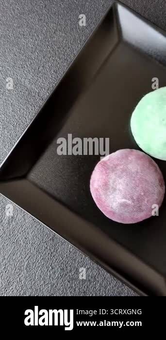 Japanese mochi, ice cream or Asian sweets made from rice flour with fruit filling. Mochi of ...