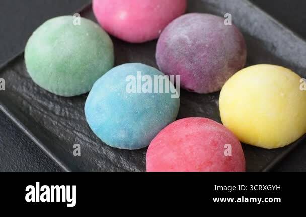 Japanese mochi, ice cream or Asian sweets made from rice flour with fruit filling. Mochi of ...