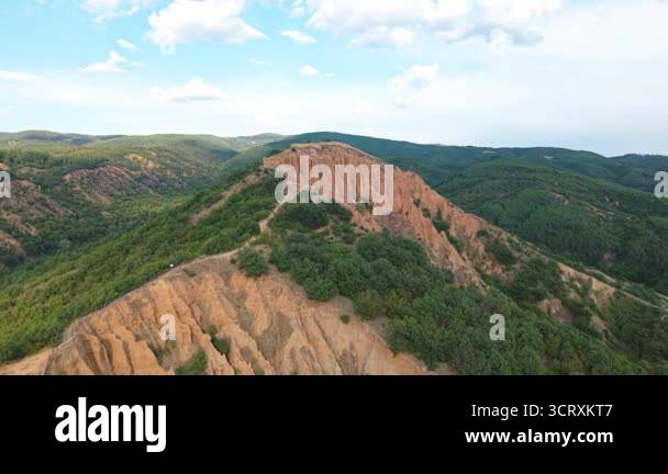 drone footage presents the stunning sandstone spires of the Stob ...