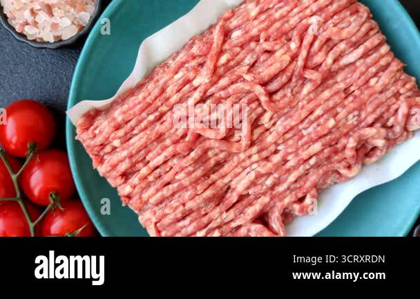 Raw ground beef or pork, prepared meat for burgers or other food ...