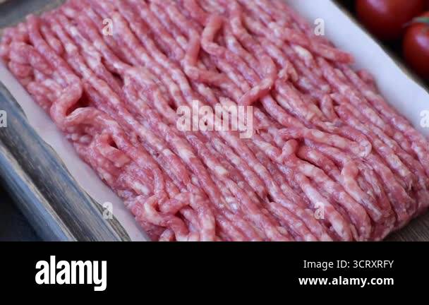 Raw ground beef or pork, prepared meat for burgers or other food ...