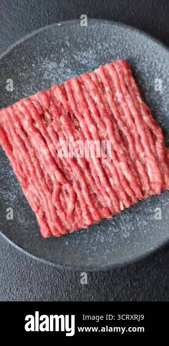 Raw minced beef or pork, ground meat for burgers. Raw minced red as ...