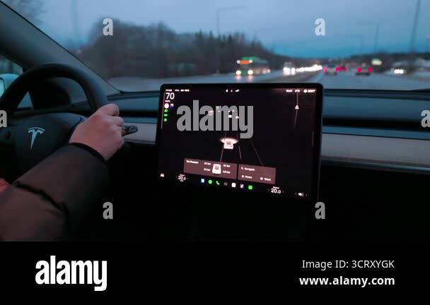 Tesla Model Y electric car interior showing autopilot interface on ...