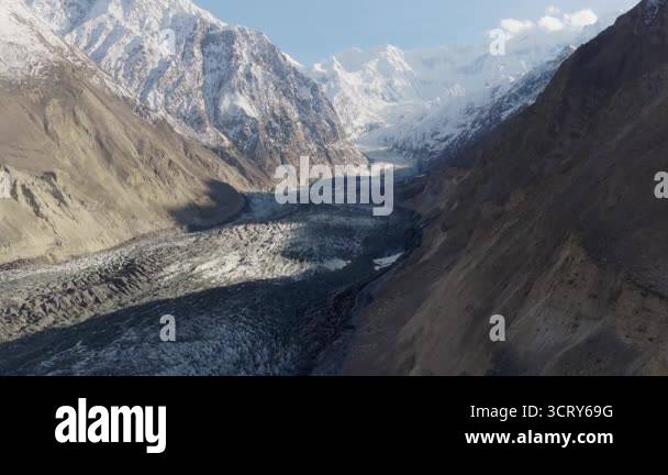 Aerial view of a majestic glacier nestled in the snowy mountains of ...