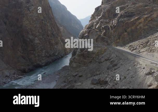 Aerial view of a winding road through a dramatic canyon in Pakistan ...