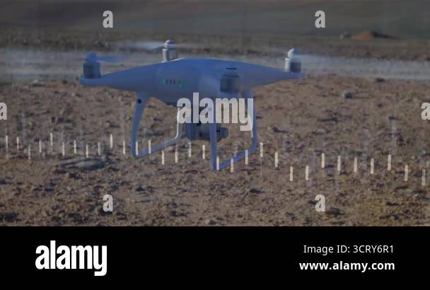 Field operator controlling drone tilting with pulsing industrial ...