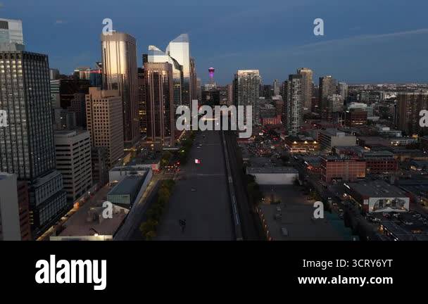 Aerial view of skyscrapers at night in Calgary, Alberta's booming ...