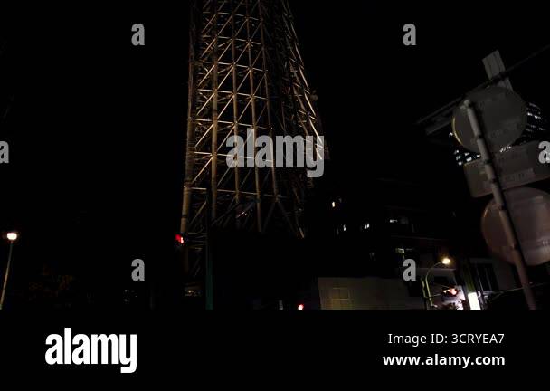 Nighttime view of a tower lighting up sequentially Stock Video Footage ...
