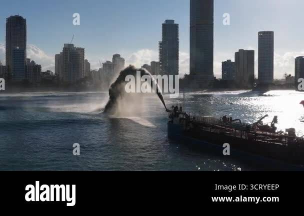 Dredging ship pumps sand onto Stock Videos & Footage - HD and 4K Video ...