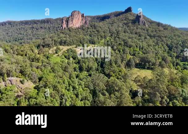 Drone footage captures the lush greenery and striking rhyolite volcanic ...