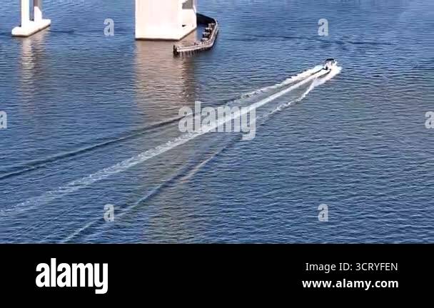 James River Lift Bridge JRB spans a calm waterway, supported by tall ...