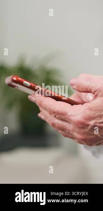Close-up view of a doctors or patients hands actively using a ...