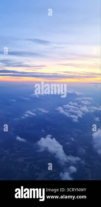 Stunning aerial view from an airplane window, flying high above the ...