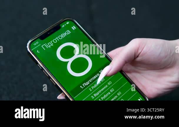 girl on phone set timer 60 seconds hold phone in hands long manicure ...