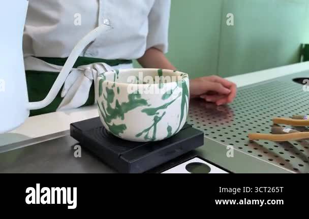 Step by step tutorial making Japanese matcha tea. Step five, pour your ...