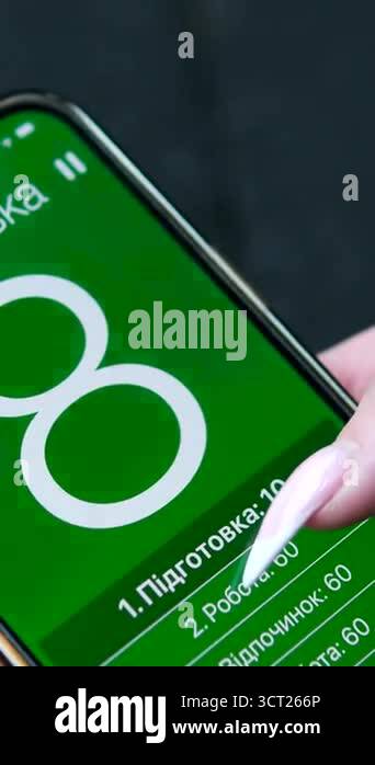 girl on phone set timer 60 seconds hold phone in hands long manicure ...