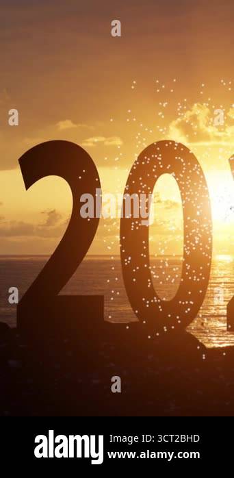 2026 numbers silhouetted against a glowing sunset, with excited people ...