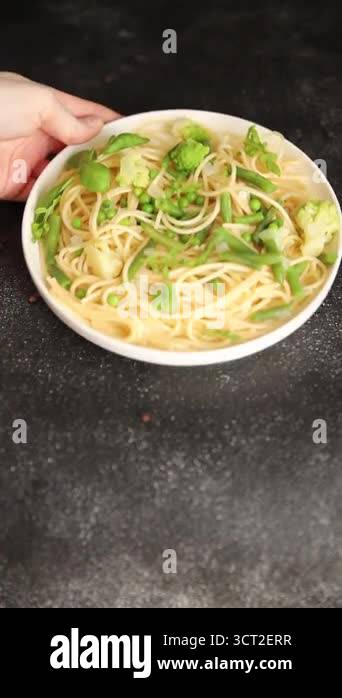 Spaghetti vegetables green peas, broccoli, string beans, kohlrabi ...