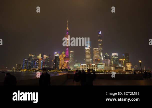Shanghai Bund and Lujiazui illuminated at night, featuring iconic ...