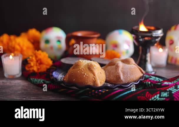Mexican bread and burning and smoky incense on Altar with sugar skull ...