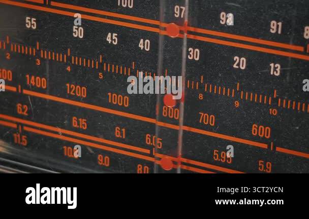 Close-up of tuning an old radio receiver, showing the needle moving ...