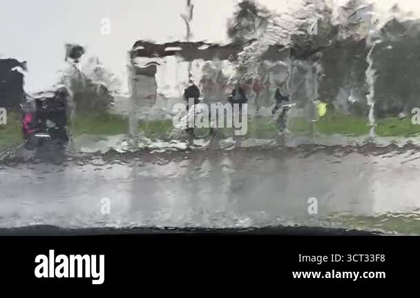 Rain heavy in downfall during storm view through car window UK Stock ...