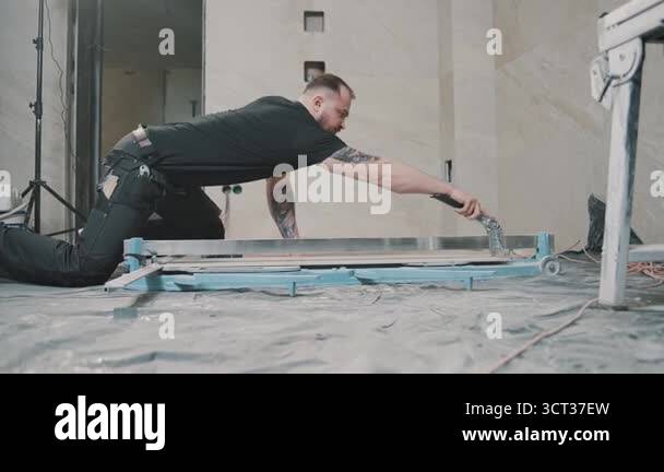 Skilled worker laying tile precision Stock Videos & Footage - HD and 4K ...
