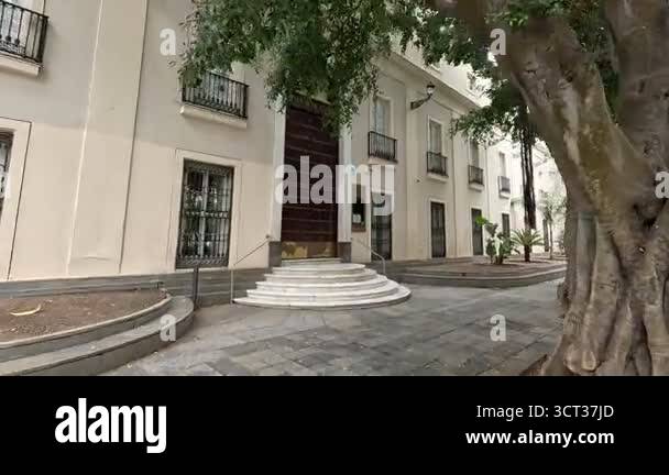 Exterior entrance door and front facade of the Museum of Cadiz, a ...