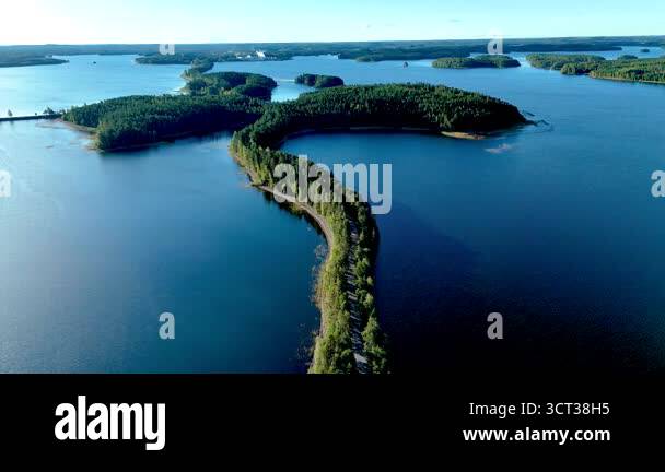 Winding through the pristine waters of Punkaharju in Finland, this ...