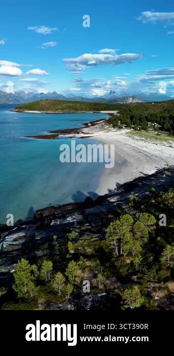 Experience the breathtaking scenery of Bognes, Norway, featuring a ...