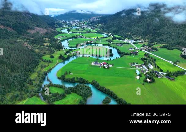 Experience the stunning beauty of Stryn, Norway, where vibrant green ...