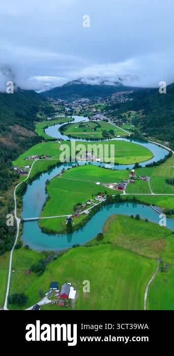 Vivid landscape of Stryn, Norway showcasing winding rivers and vibrant ...