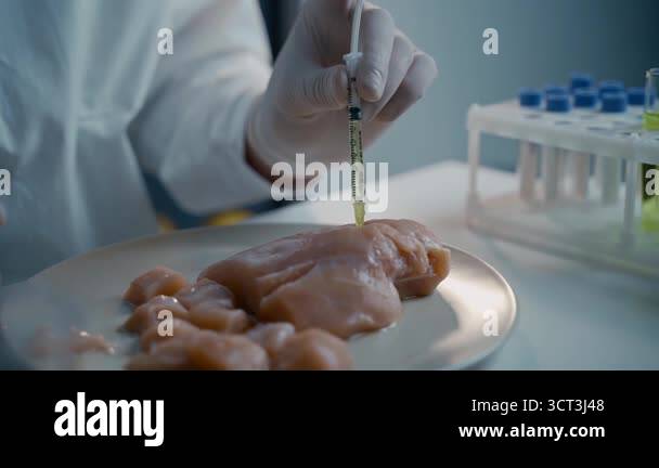 Male nutrition expert testing food products in laboratory. Lab ...
