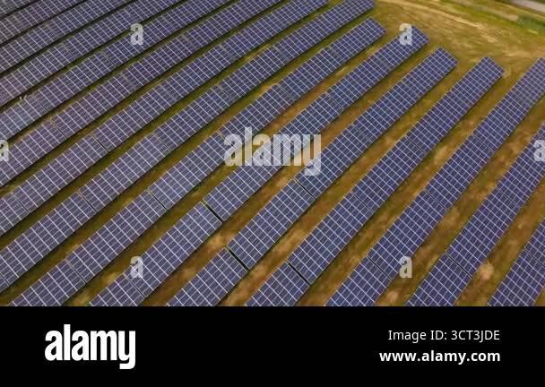 Aerial view of large solar power farm with photovoltaic panels ...