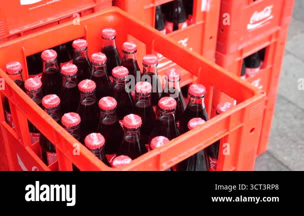 turkey istanbul 23 june 2025. Bottles of coka cola in bright orange ...