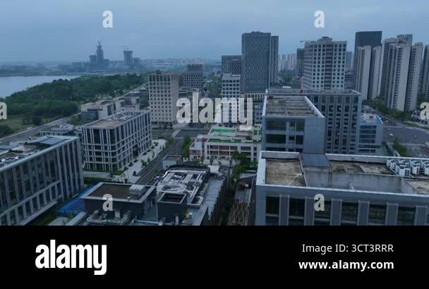 aerial video of a modern city, multiple high-rise buildings and ...
