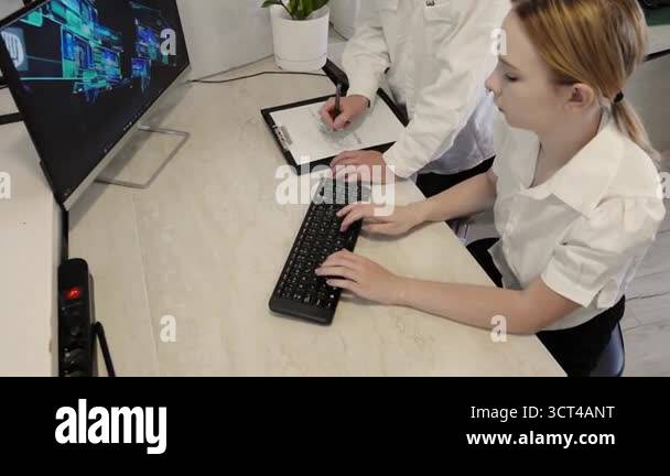 People working at home on a computer: a woman typing on a keyboard, a ...
