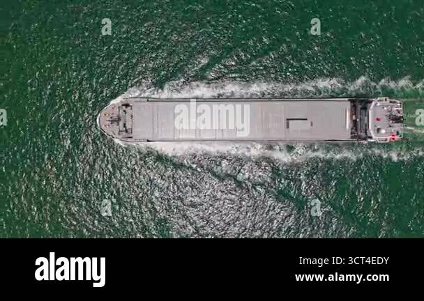 Cargo business. Empty barge. Cargo ship with container at sea, aerial ...