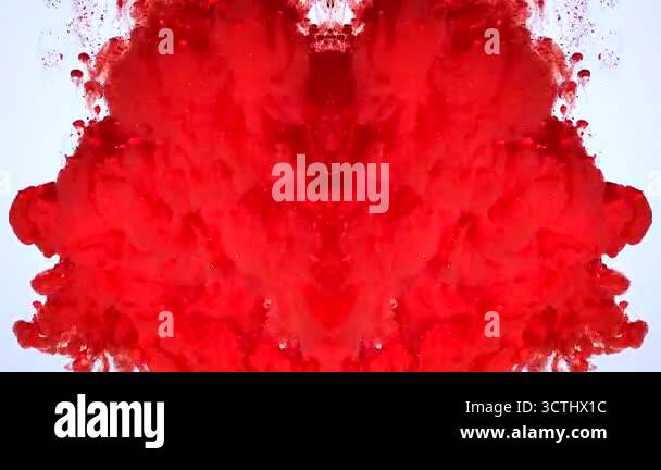 A bright blood-red explosion of colors on a white background. A fiery ...