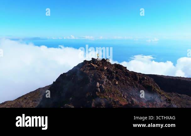 Hiker Man on Top of Mount Pico above Clouds on Sunny Day. Summit and ...