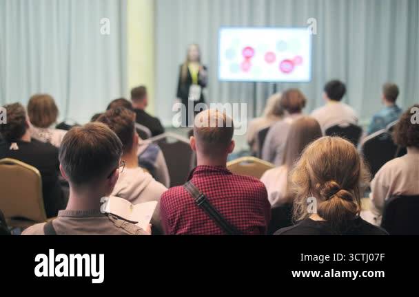 Audience engaged in learning or professional development at a ...