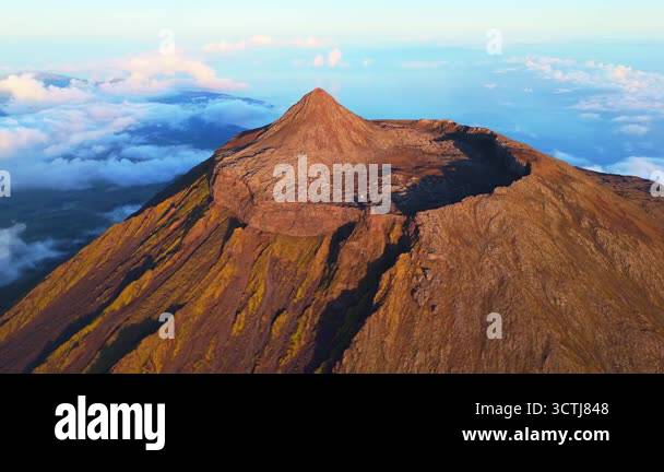 Top of Mount Pico Stratovolcano, Crater and Clouds at Sunset. Shadow of ...