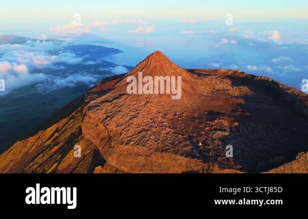 Top of Mount Pico Stratovolcano, Crater and Clouds at Sunset. Shadow of ...