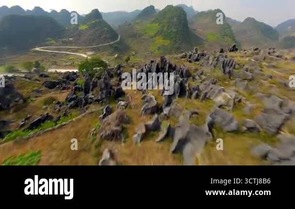 Cinematic FPV drone flight through dramatic limestone mountains and ...